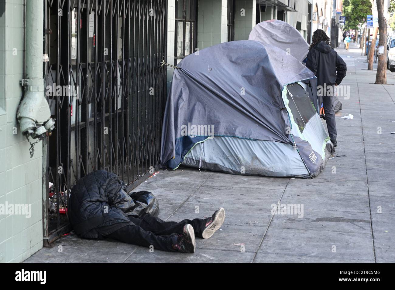 San Francisco, CA, USA - July 26, 2023: A homeless man sleep on the ...