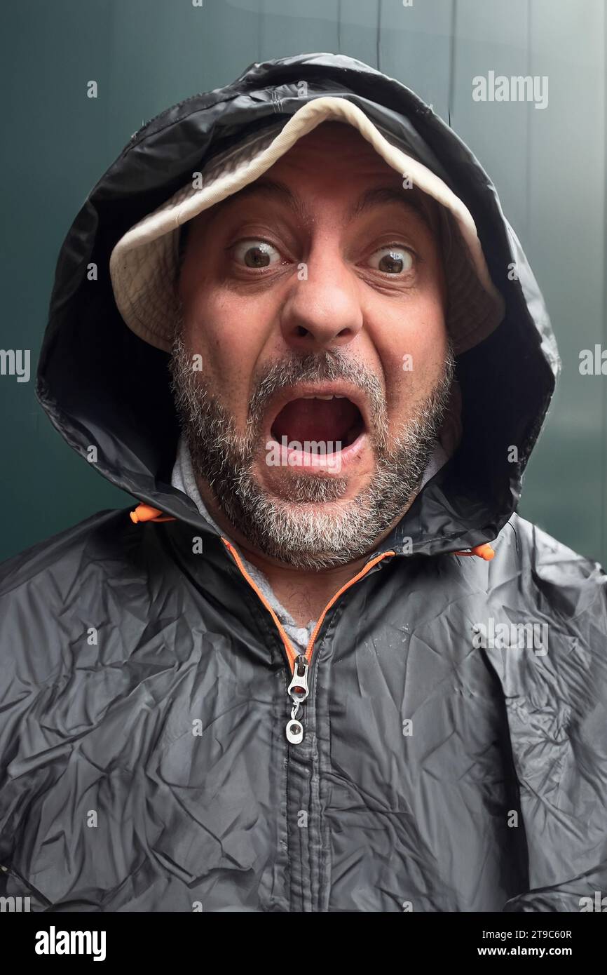 Facial expressions, portrait of angry fisherman Stock Photo - Alamy