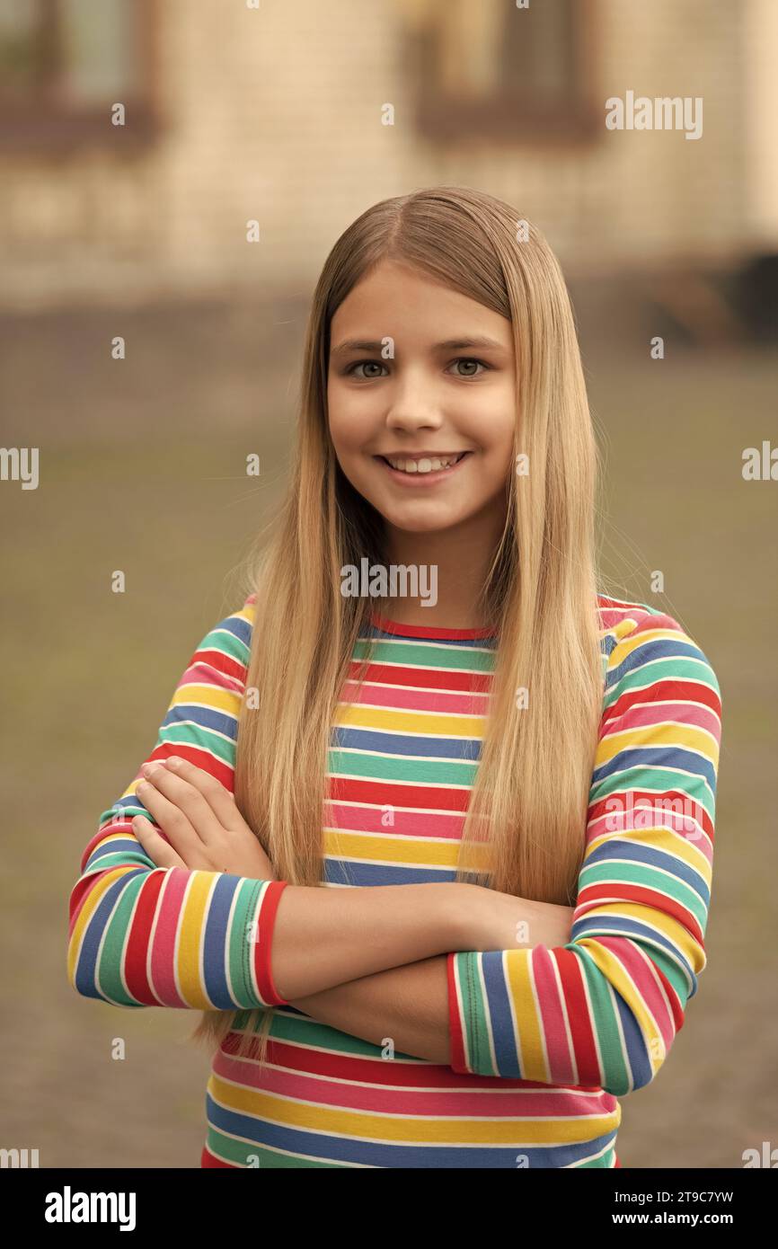 smiling blonde teen girl in childhood. teen girl childhood outdoor ...
