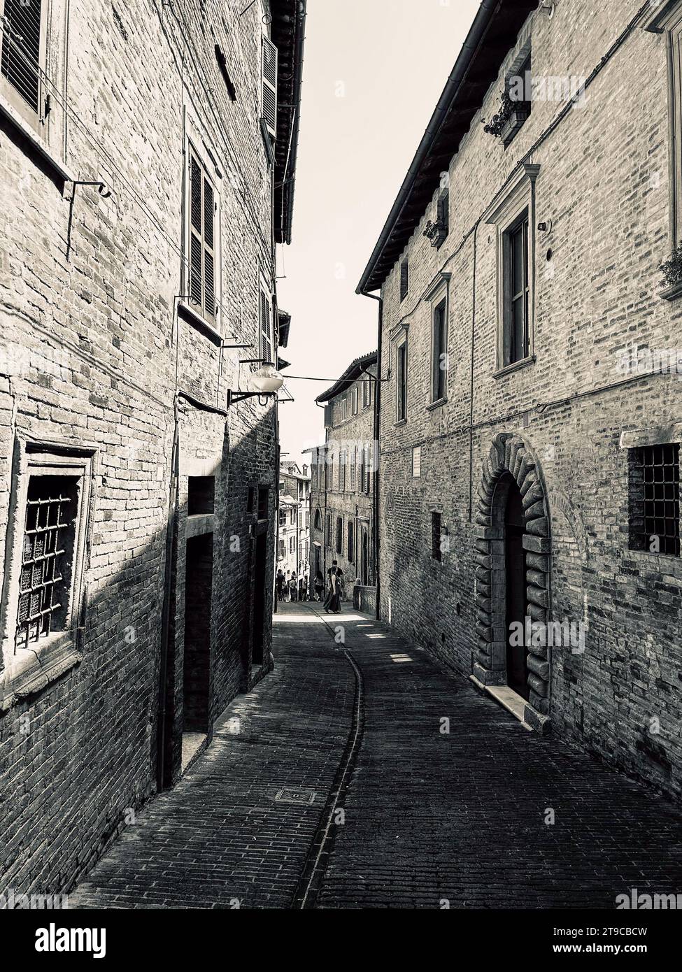 Timeless passage: A narrow stone street winds its way through the ...