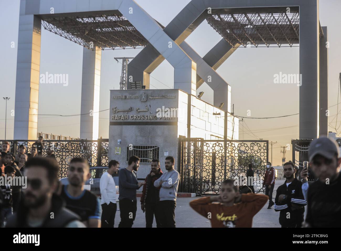 Rafah, Palestinian Territories. 24th Nov, 2023. Palestinians gather in ...