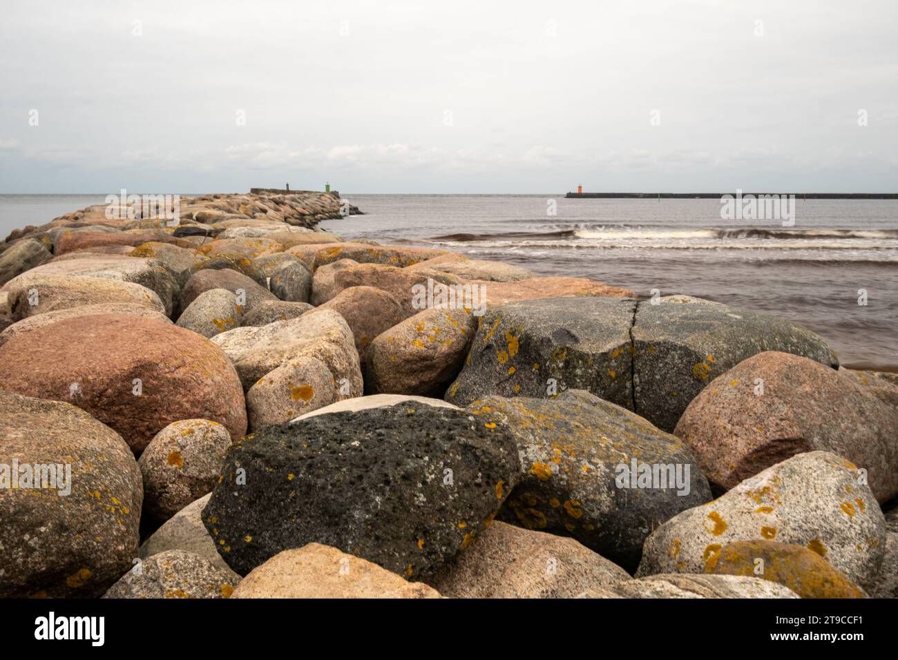 Stone jetty's path reveals the beacon, a sentinel perched to witness ...