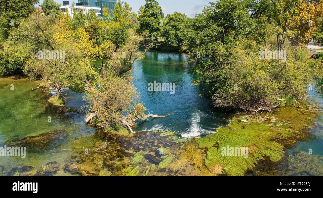The River Una as it passes through central Bihac in Una-Sana Canton ...