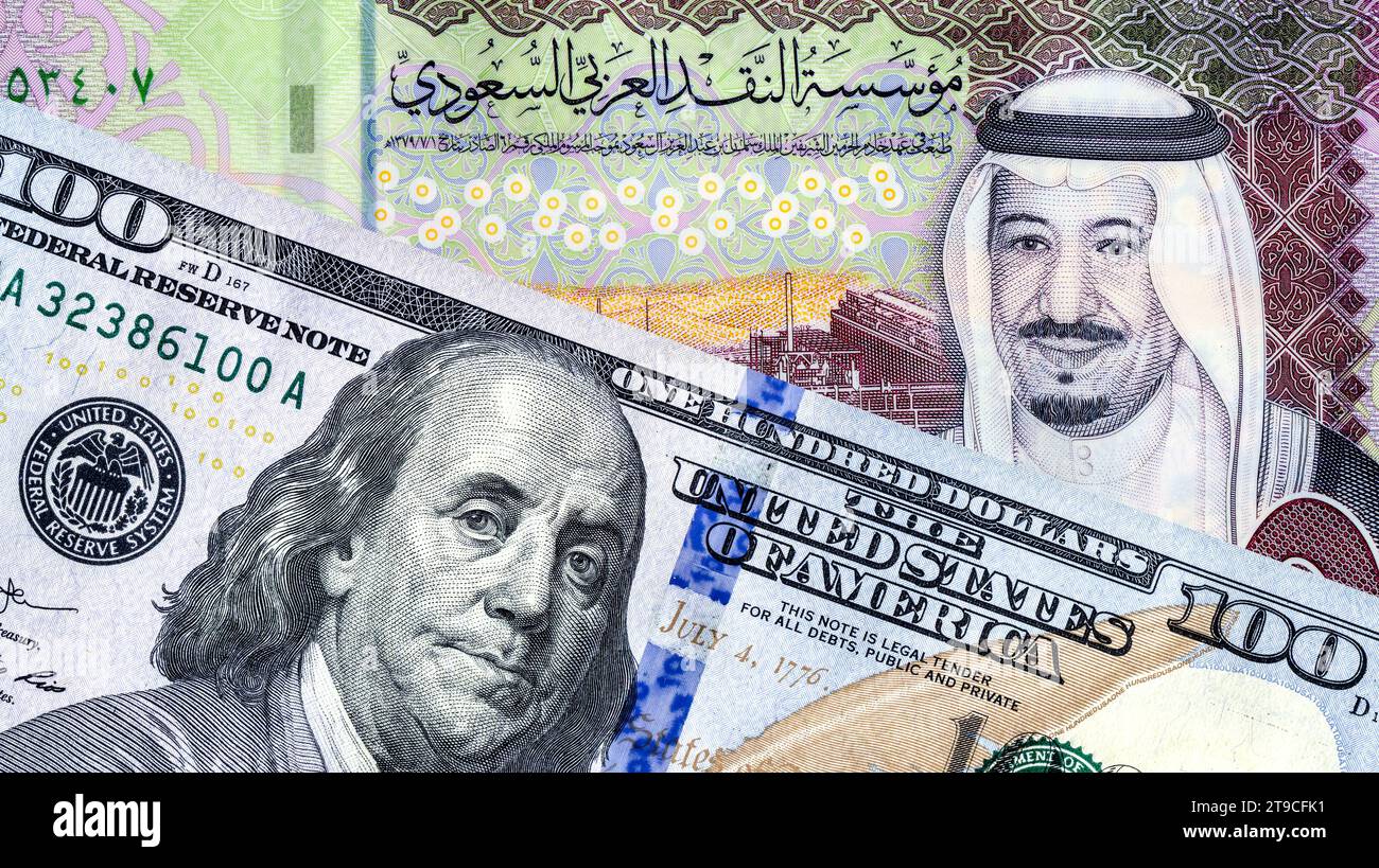 American dollars banknote with Benjamin Franklin and Saudi Arabia ...