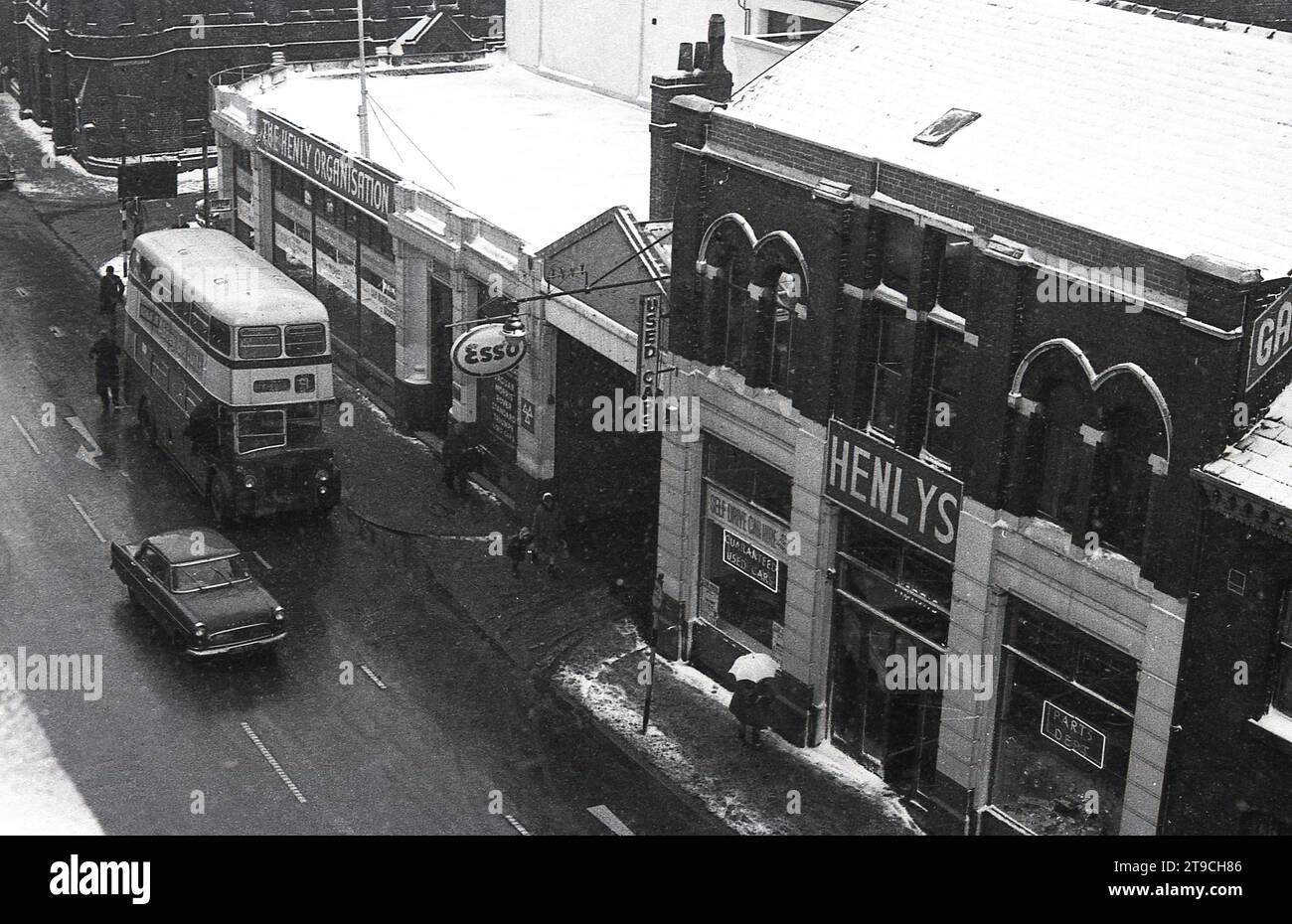 1960s, historical, wintertime and a view over a street in Oldham ...
