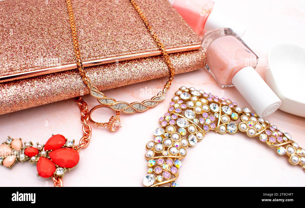 Rose gold flat lay fashion and jewelry concept with rose quartz ...