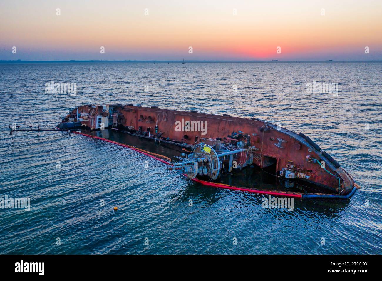 Stormy Seas Havoc: Aerial Glimpse of a Capsized Cargo Vessel Stock ...