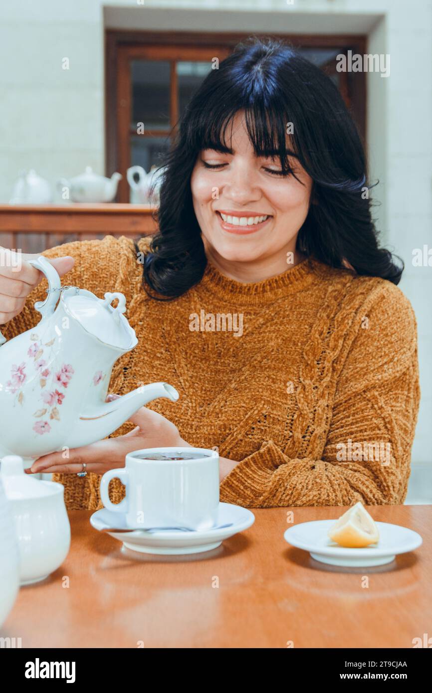 Vertical image of young cute Venezuelan Latin woman, black hair ...
