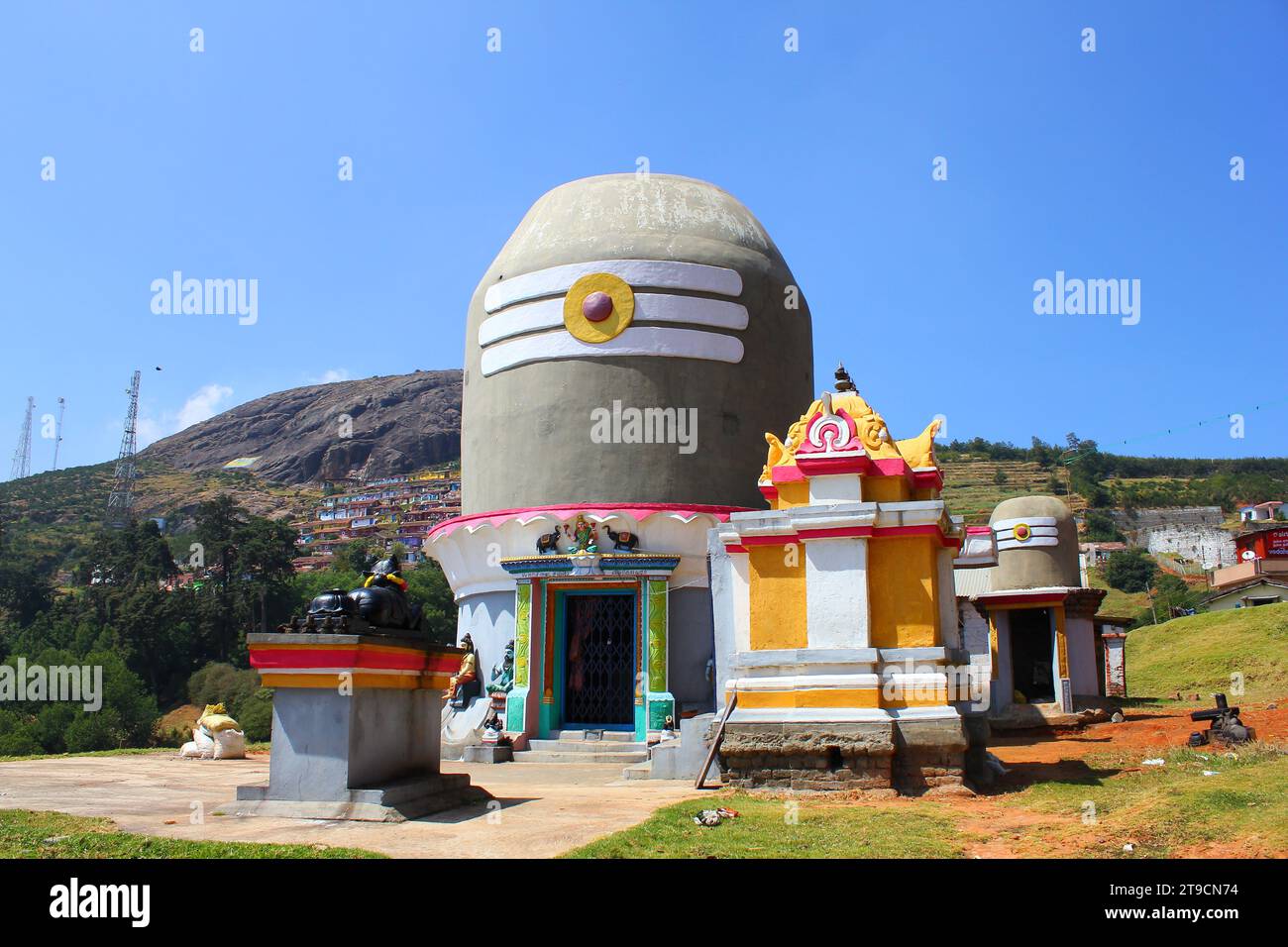 A Shiva temple at the foot of the hill Stock Photo - Alamy