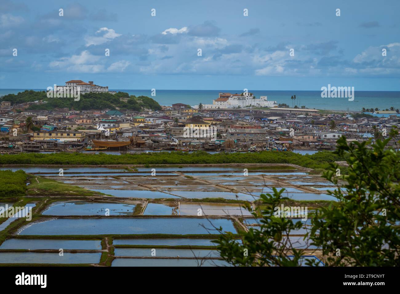View on Elmina Castle in Ghana with trees and ocean Stock Photo - Alamy