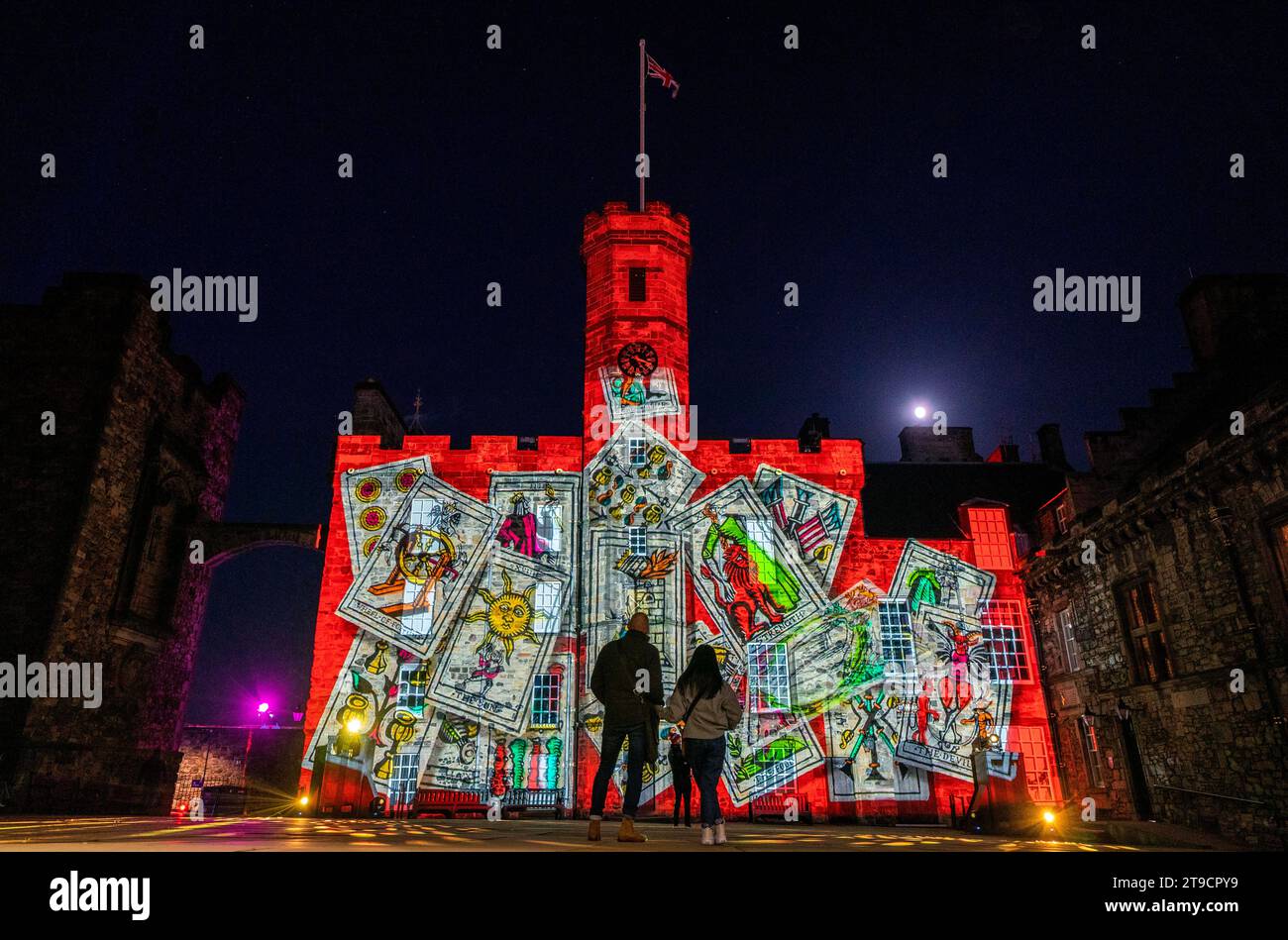 A couple view the projections in Crown Square at the Castle of Light ...