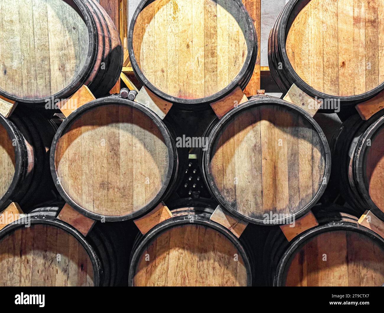Wine barrels, winery, aging process in wooden containers Stock Photo ...