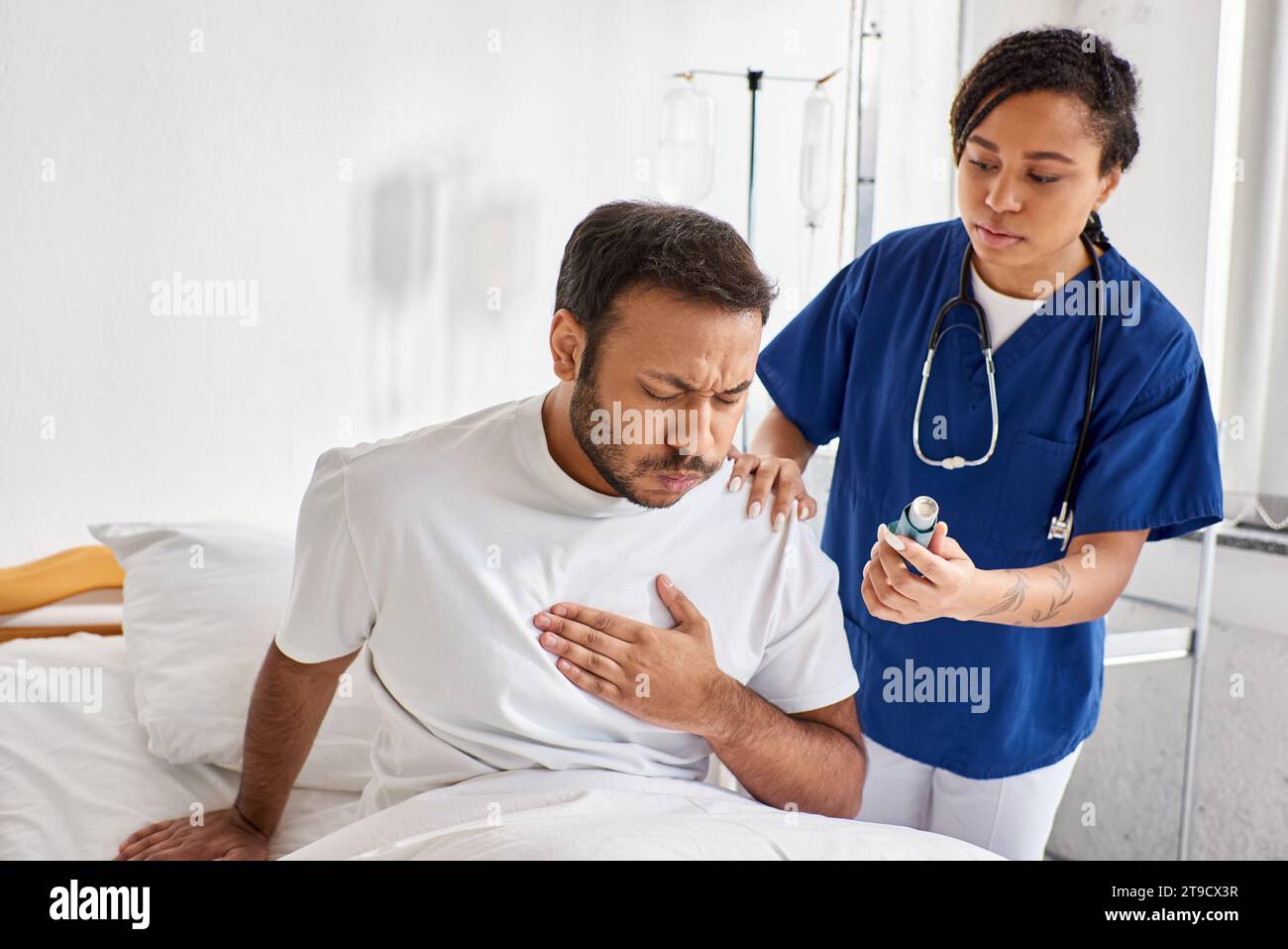young african american nurse giving asthma inhaler to her ill indian ...