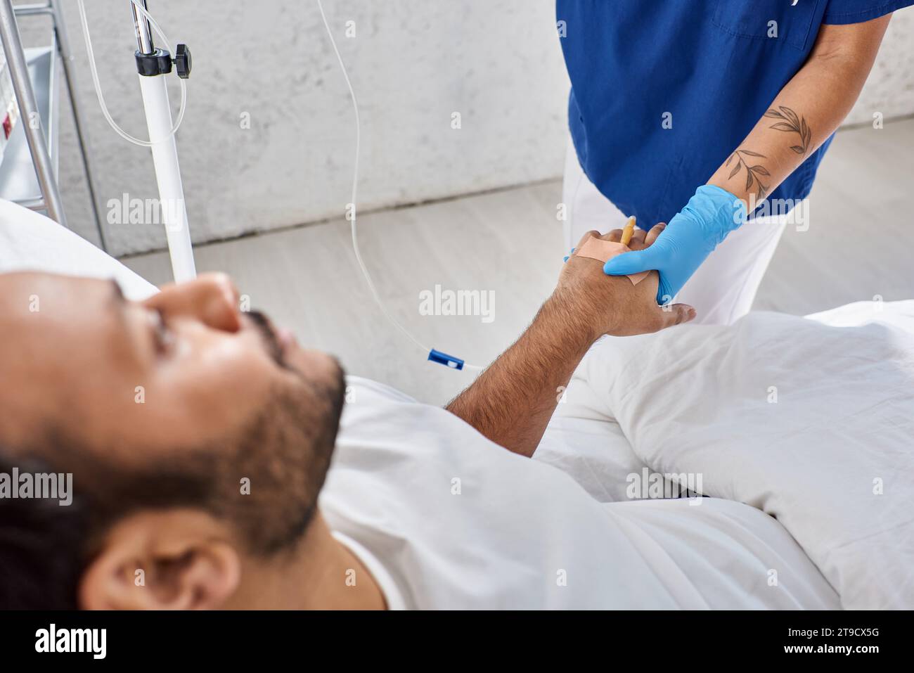 focus on african american nurse setting drop counter next to her ...