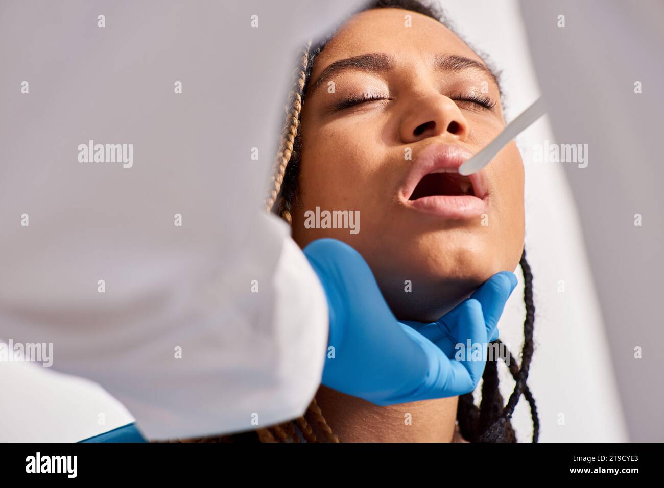 African american doctor check up hi-res stock photography and images ...