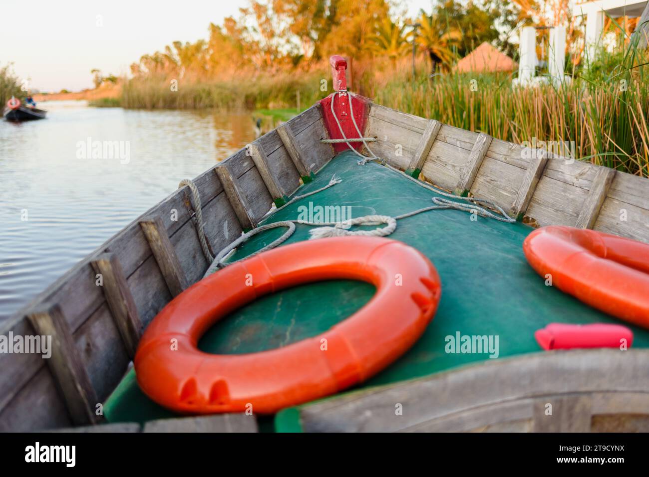 A traditional Valencian boat in the lagoon, with life buoys Stock Photo ...