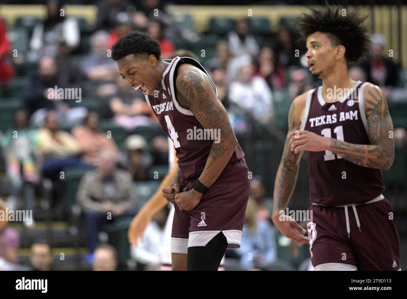 Texas A&M guard Wade Taylor IV (4) reacts after scoring a 3-pointer ...