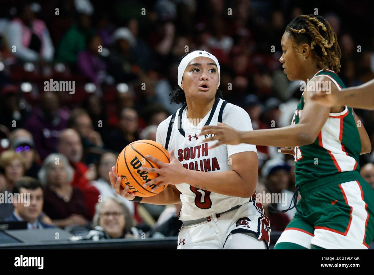 South Carolina guard Te-Hina Paopao, left, looks to pass against ...