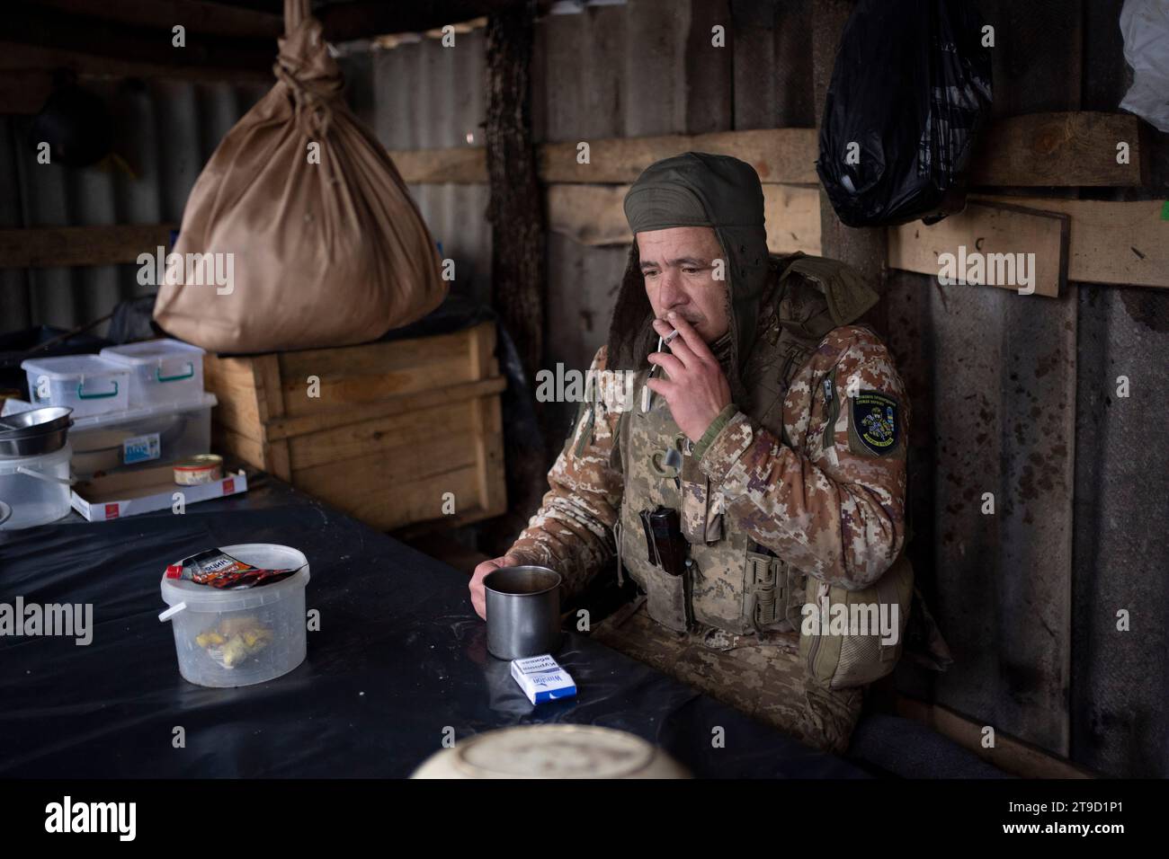 Ivan Kravchenko, a soldier of the state border guard, takes a break after he stood watch at a ...