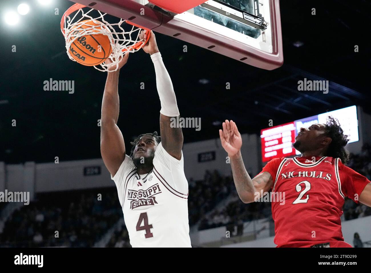Mississippi State forward Cameron Matthews (4) dunks past Nicholls ...
