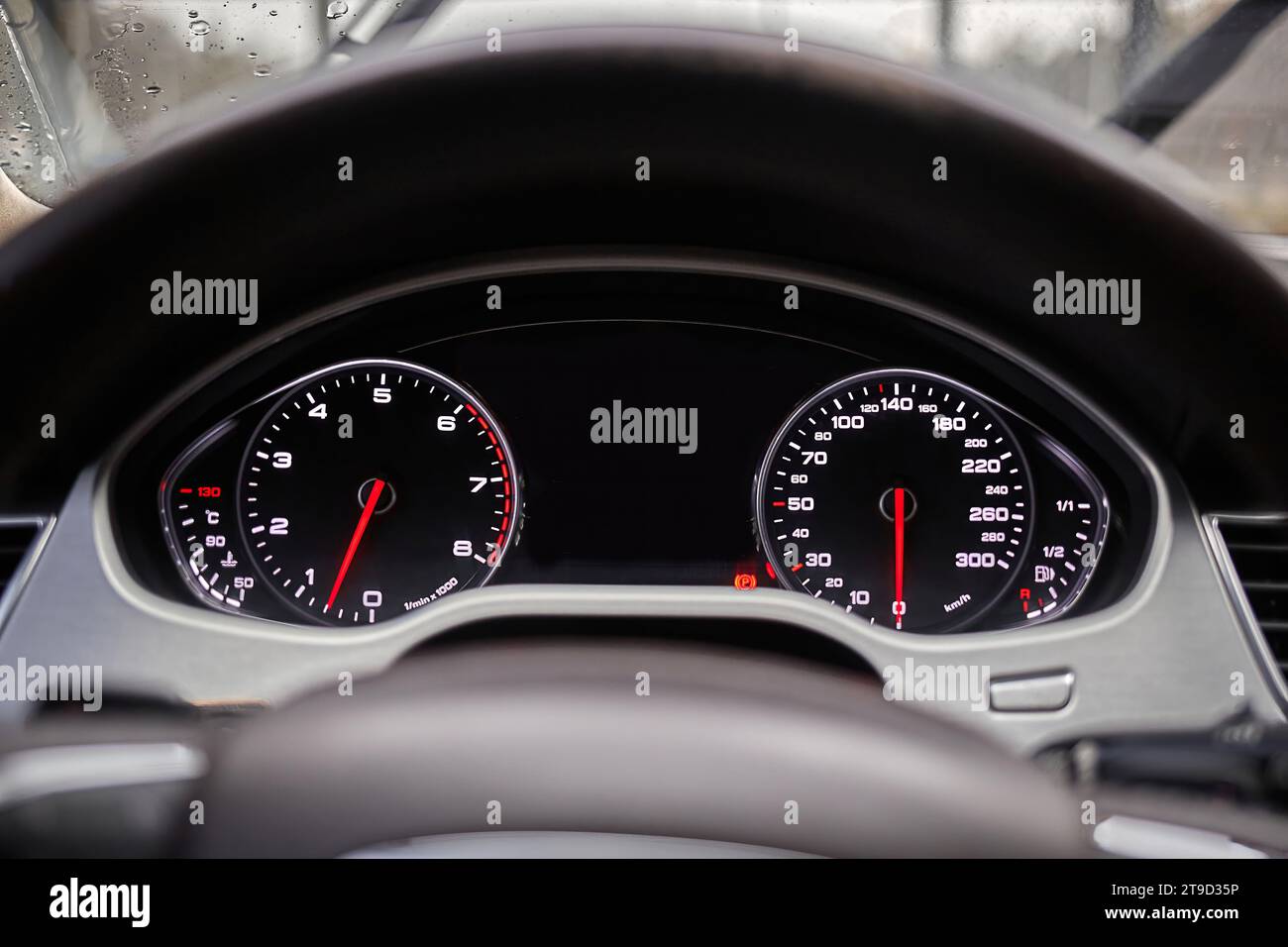 Sport car speedometer and sensors on a control panel background, modern ...