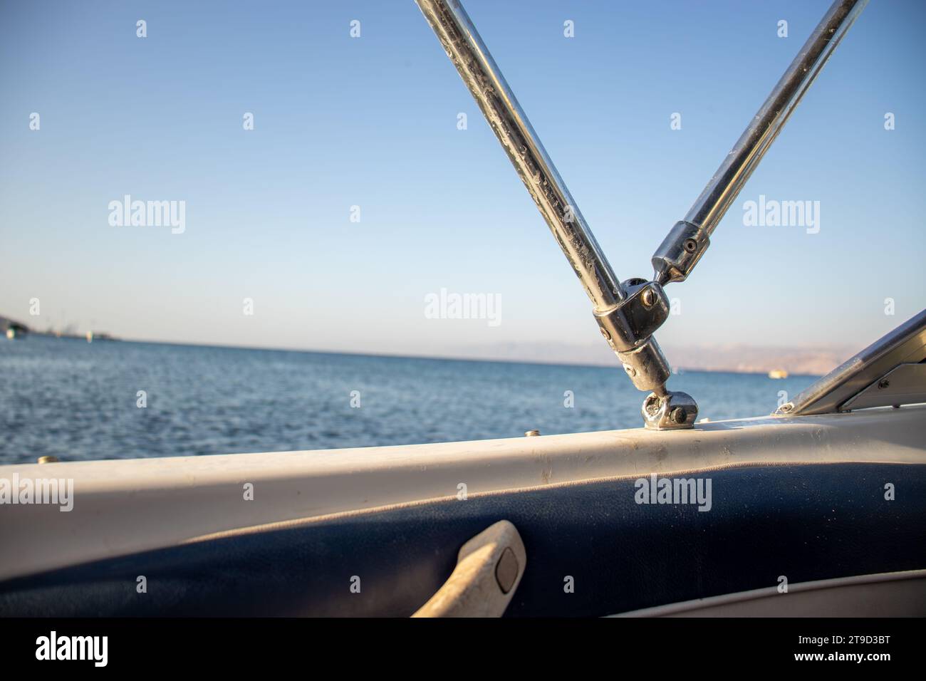 Ball and joint for ship holder with sea in the background as ...