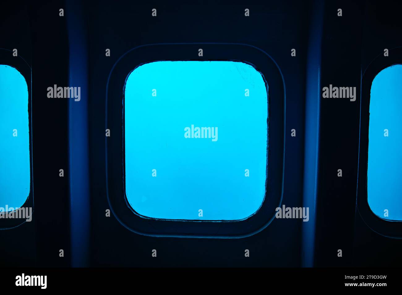 Silhouette ship window with blue ocean water seen through glass Stock ...