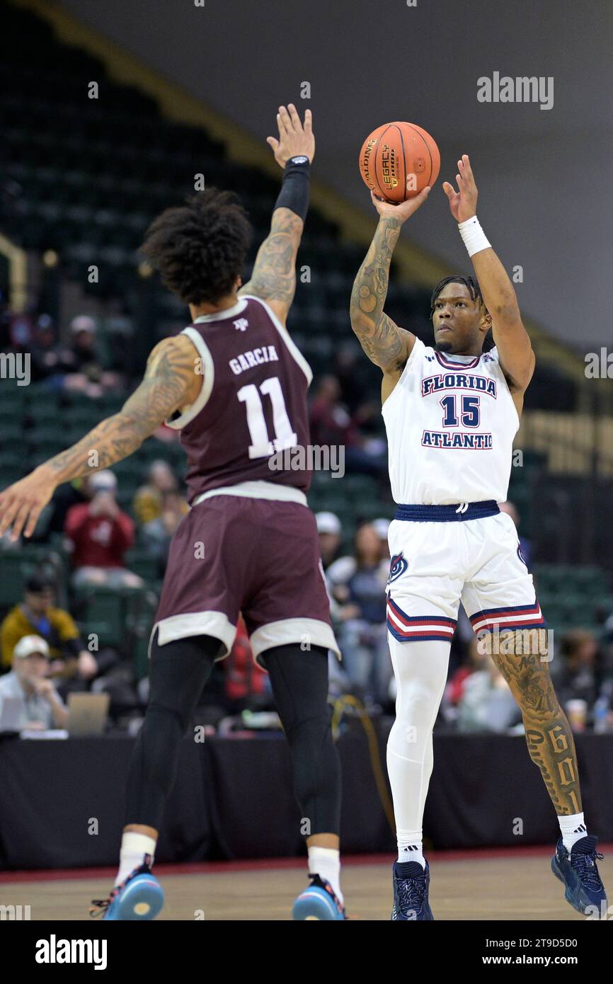 Florida Atlantic guard Alijah Martin (15) shoots a 3-pointer in front ...
