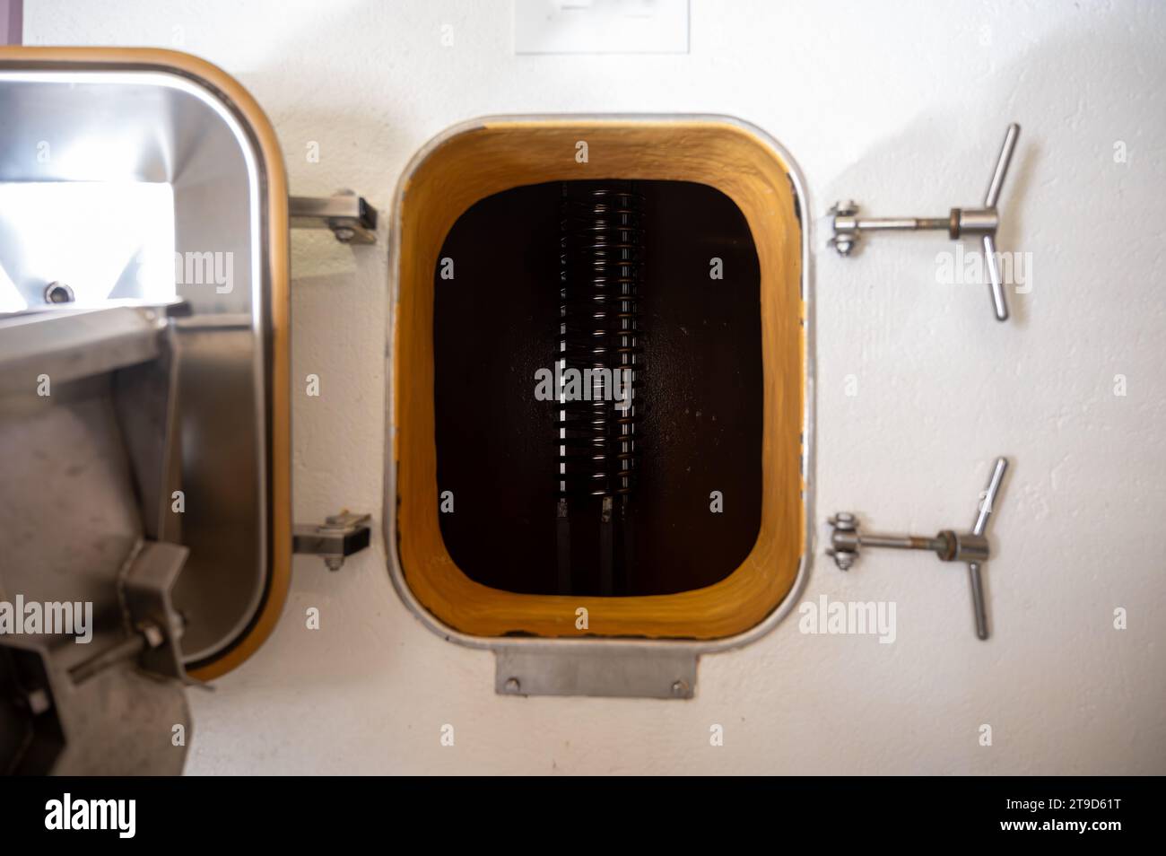 Old concrete tanks for first fermentation of grapes on Bordeaux winery ...
