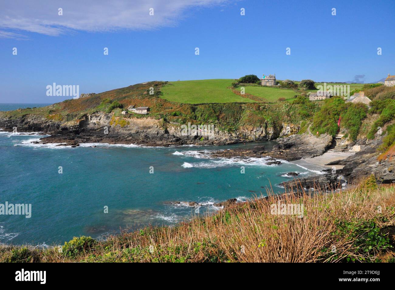 Autumn sunshine lights Prussia cove near Marizion in Cornwall ...