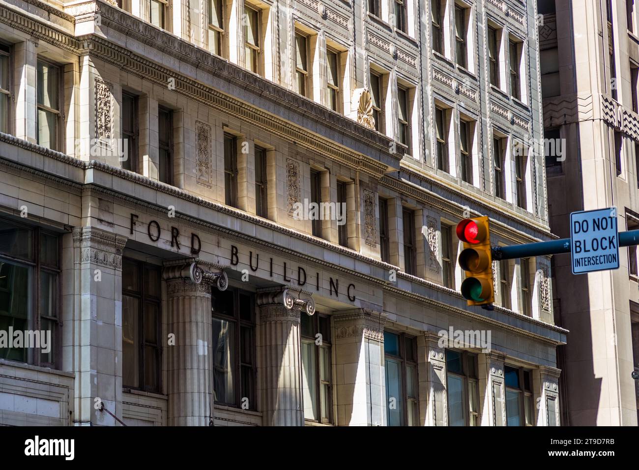 Facade of the Ford Building in Detroit with red traffic light. Detroit ...