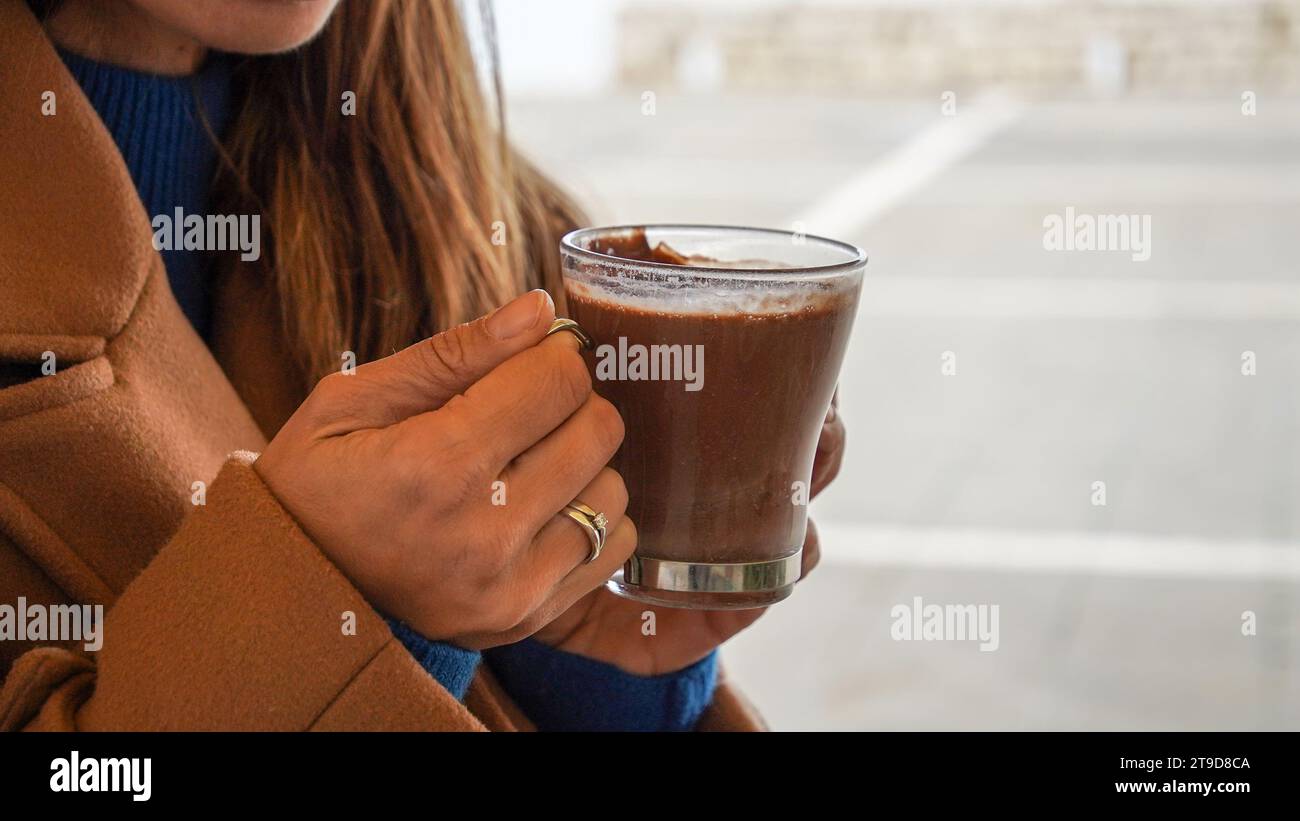Closeup girl drinking hot chocolate hi-res stock photography and images ...