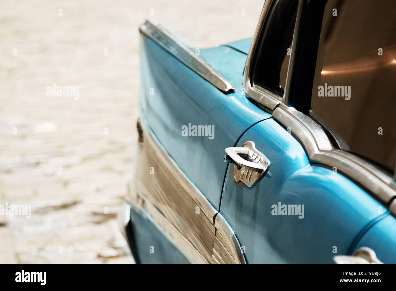 Close-up of a rear side of a shiny old blue car Stock Photo - Alamy
