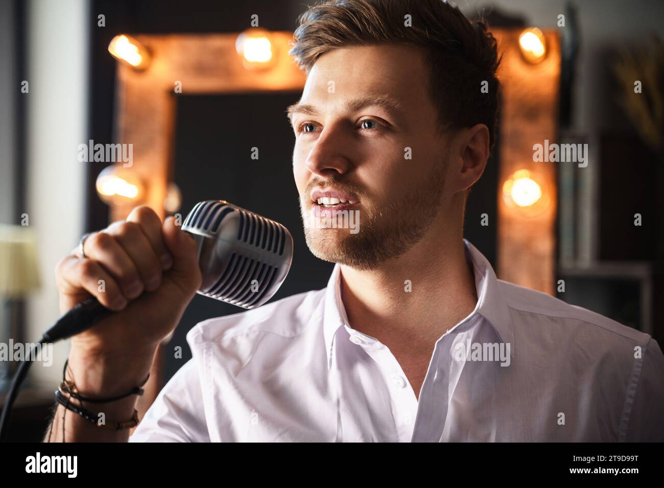 Bearded man singing microphone hi-res stock photography and images - Alamy