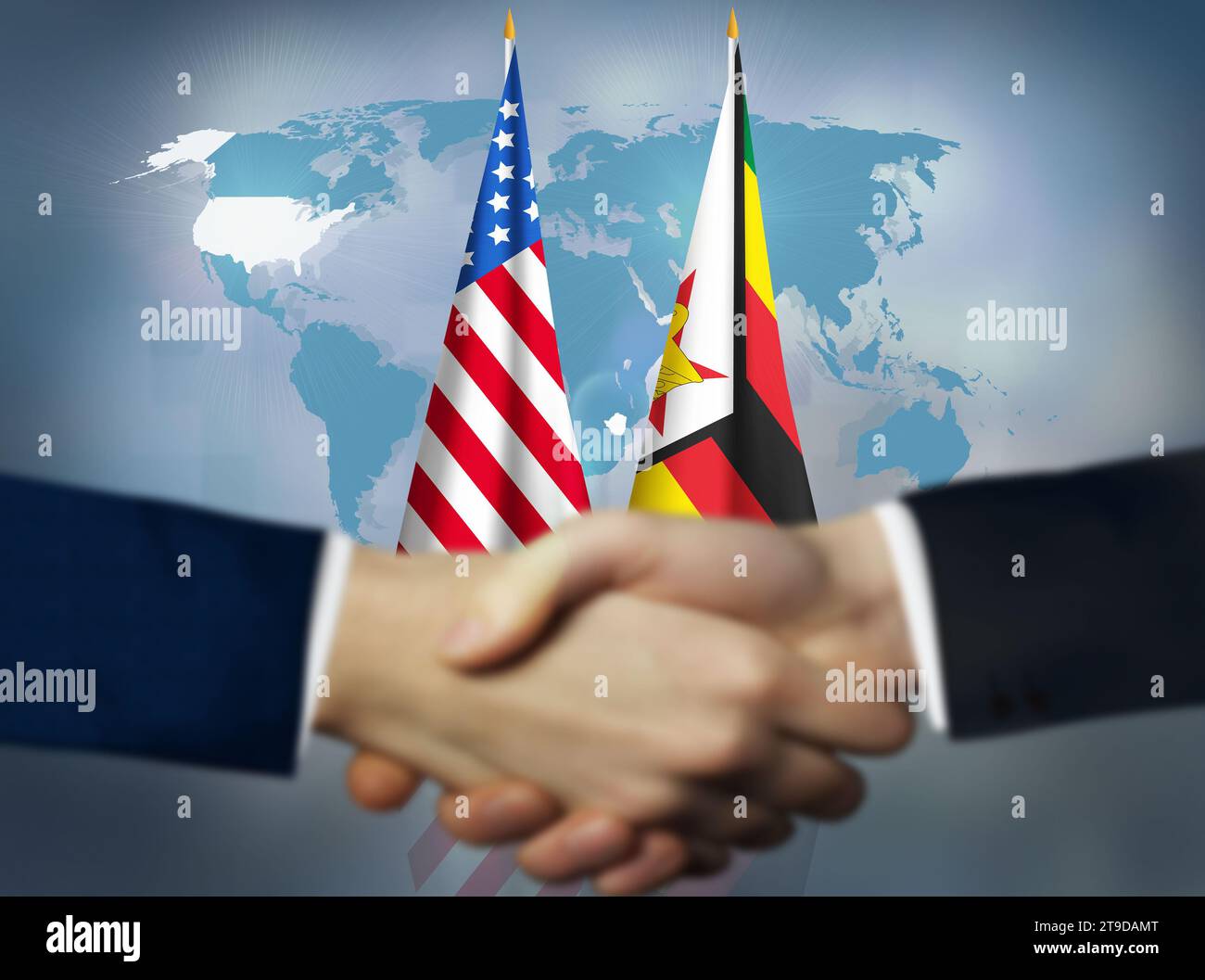 Two people shaking hands in front of American and Zimbabwe flags.USA ...