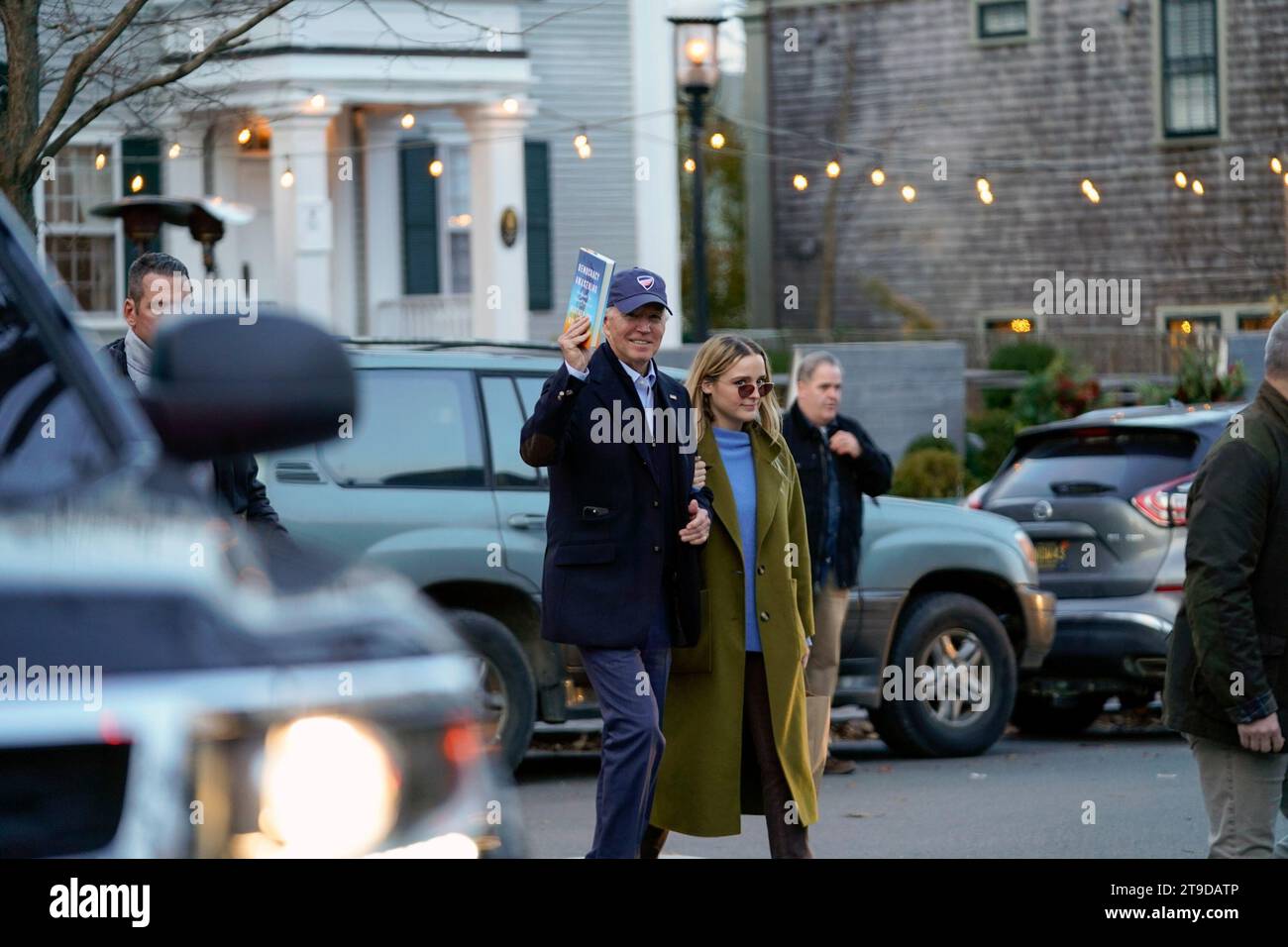 President Joe Biden holds a copy of "Democracy Awakening" by Heather ...