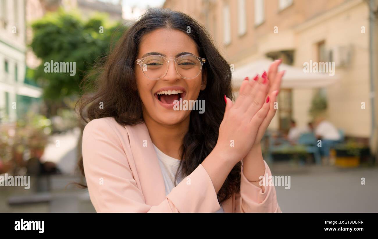Close up portrait amazed excited happy Indian Arabian ethnic woman lady ...