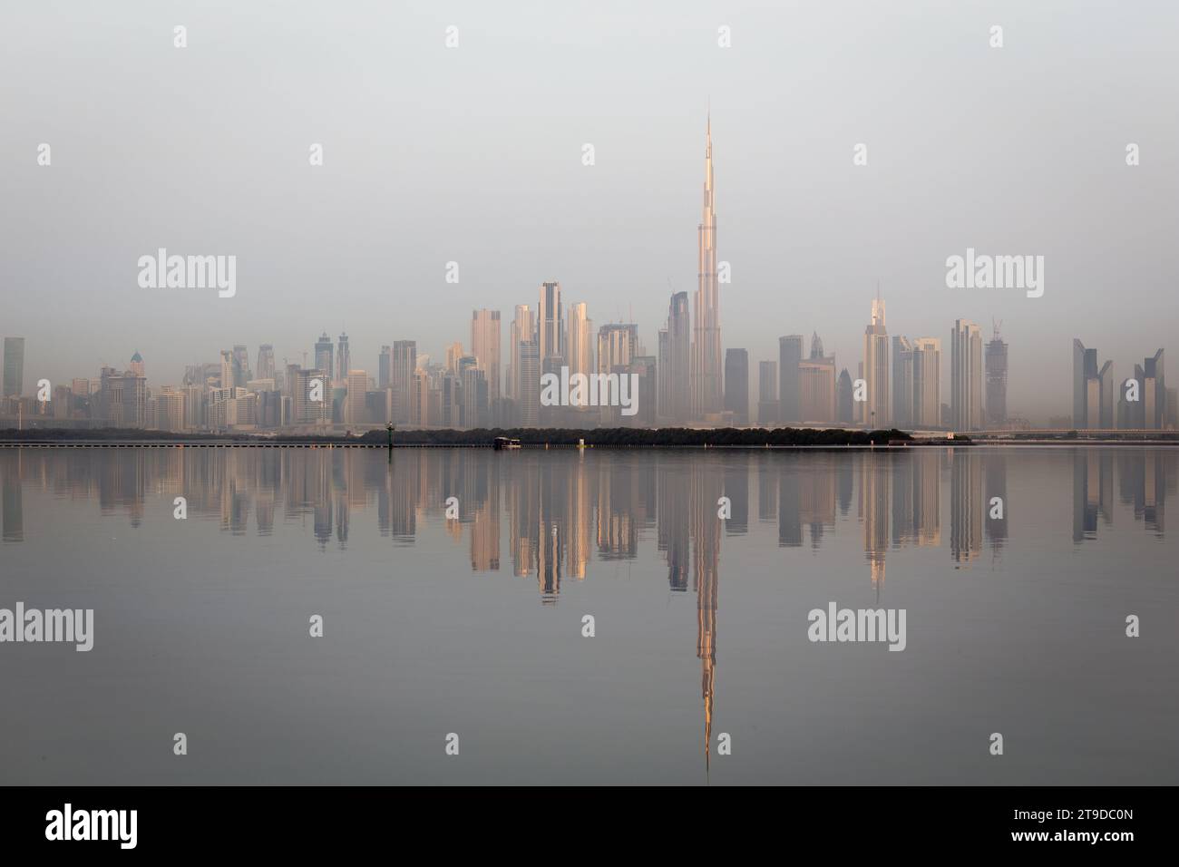 Dubai Downtown skyline landscape with the skyscrapers reflecting golden ...