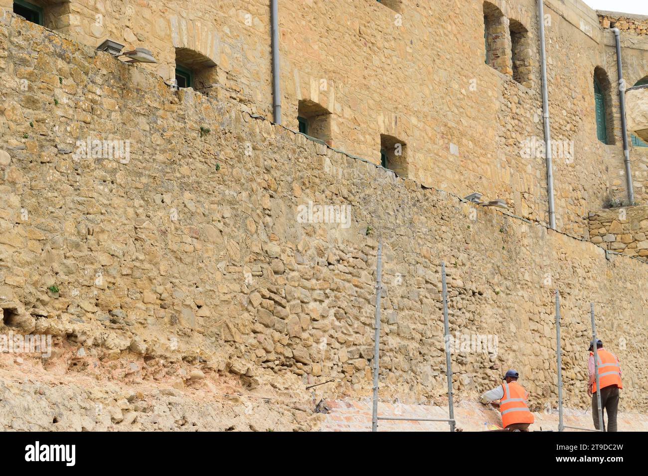 non edited picture of workers working on renewing and renovation of old ...