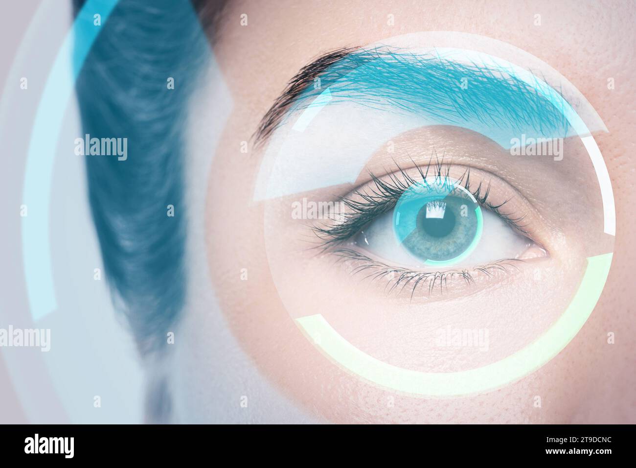 Close-up of female eye with HUD display. Concepts of augmented reality ...