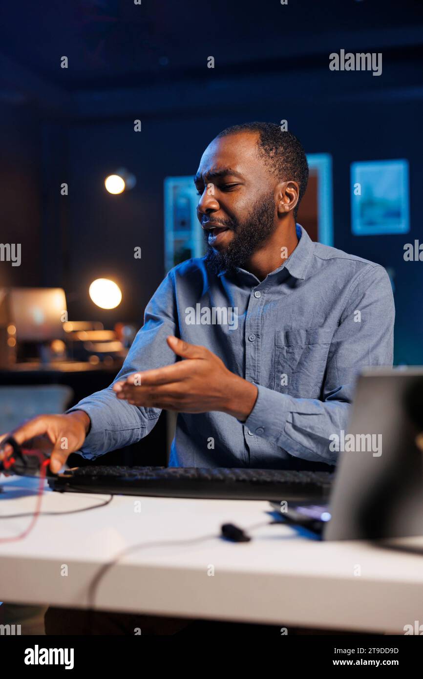 African american technology internet star filming review of newly ...