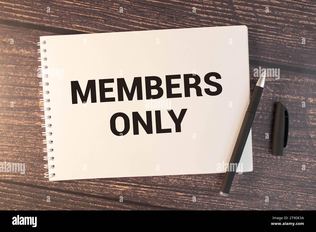 MEMBERS ONLY on a card Businessman holds. VIP clients in business ...