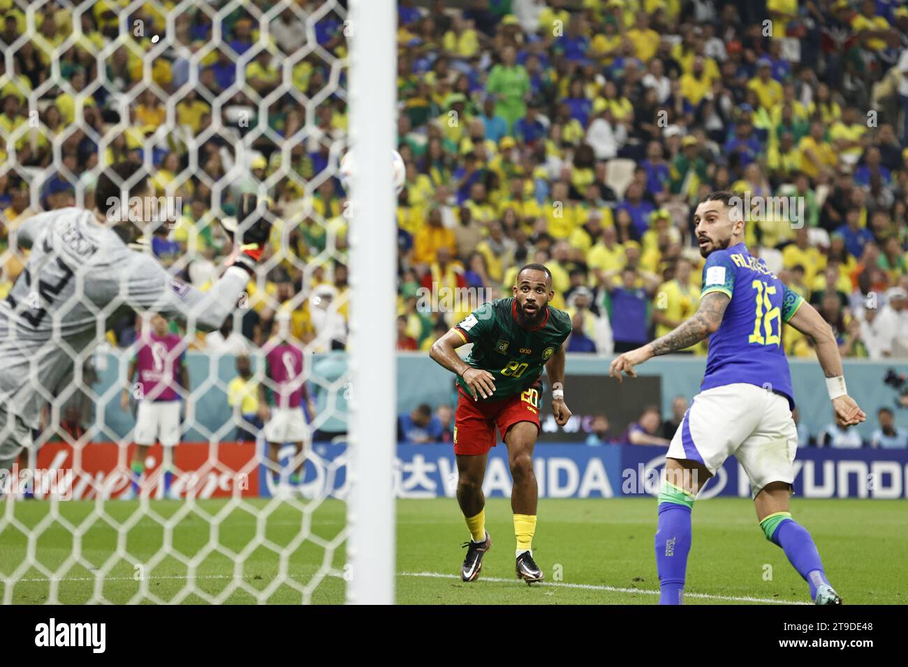 LUSAIL CITY - (L-R) Brazil goalkeeper Ederson, Bryan Mbeumo of Cameroon ...