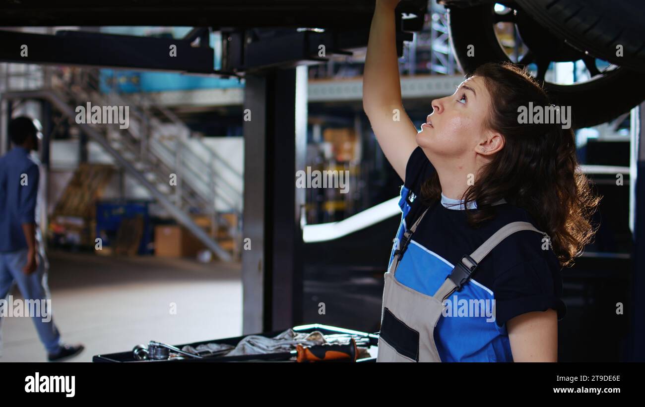 Woman changing wheel on her car hi-res stock photography and images - Alamy