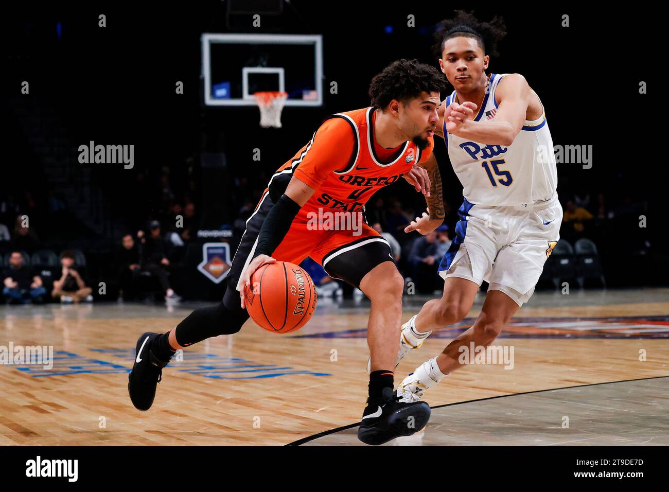 Oregon St guard Jordan Pope (0) drives past Pittsburgh guard Jaland ...