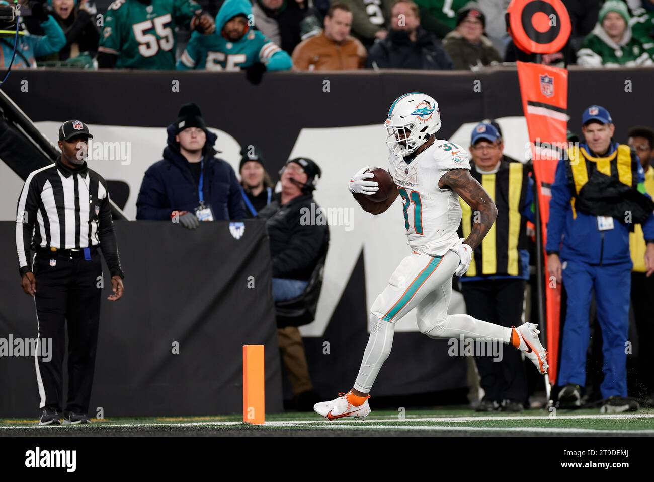 Miami Dolphins running back Raheem Mostert (31) crosses the goal line for a touchdown against ...