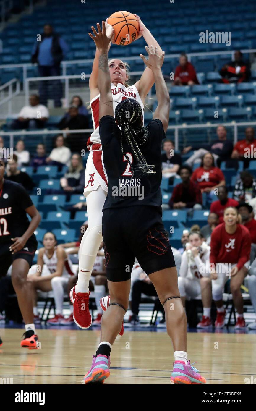 Alabama guard Sarah Ashlee Barker, back, puts up a shot over Louisville ...