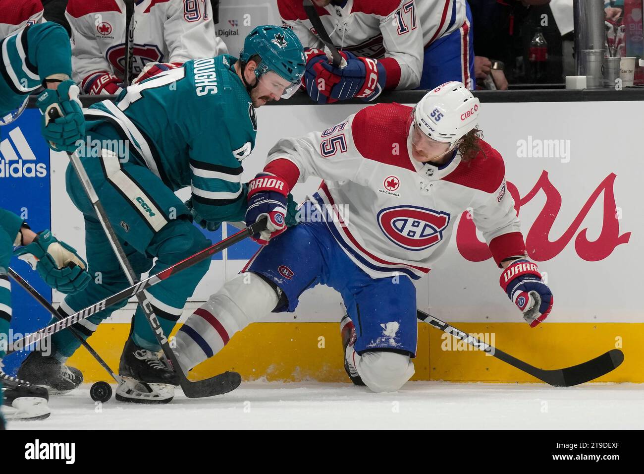 Montreal Canadiens left wing Michael Pezzetta (55) reaches for the puck ...