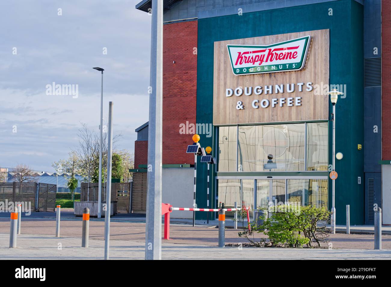 Krispy Kreme sign at cafe serving doughnuts and coffee Stock Photo - Alamy