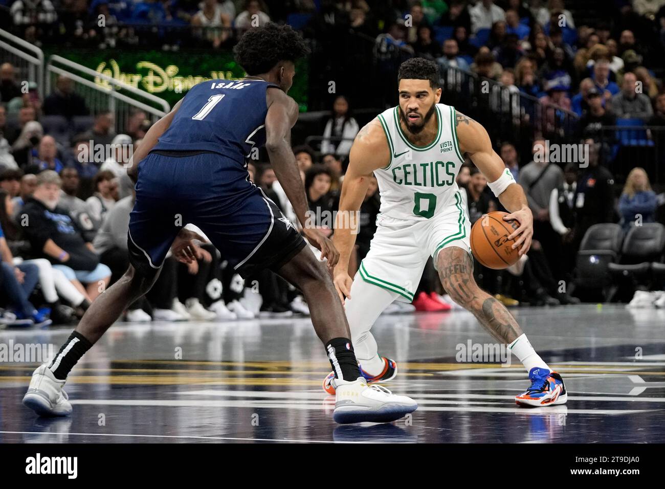 Boston Celtics forward Jayson Tatum (0) looks for a way past Orlando ...
